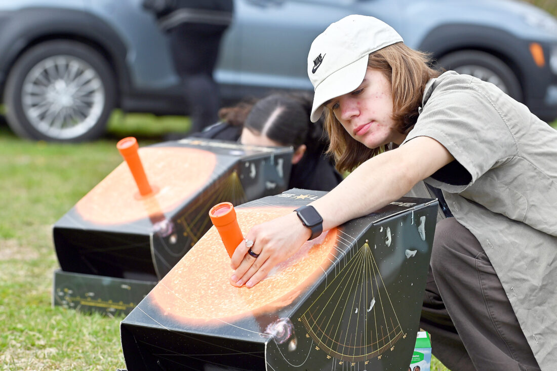 Celestial spectacle: Hundreds gravitate to Fort Roberdeau to view solar ...